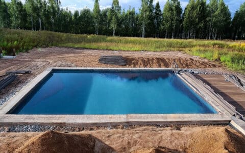 Zwemvijver aanleggen: Stap-voor-stap naar natuurlijk zwemwater - Vijverdesign